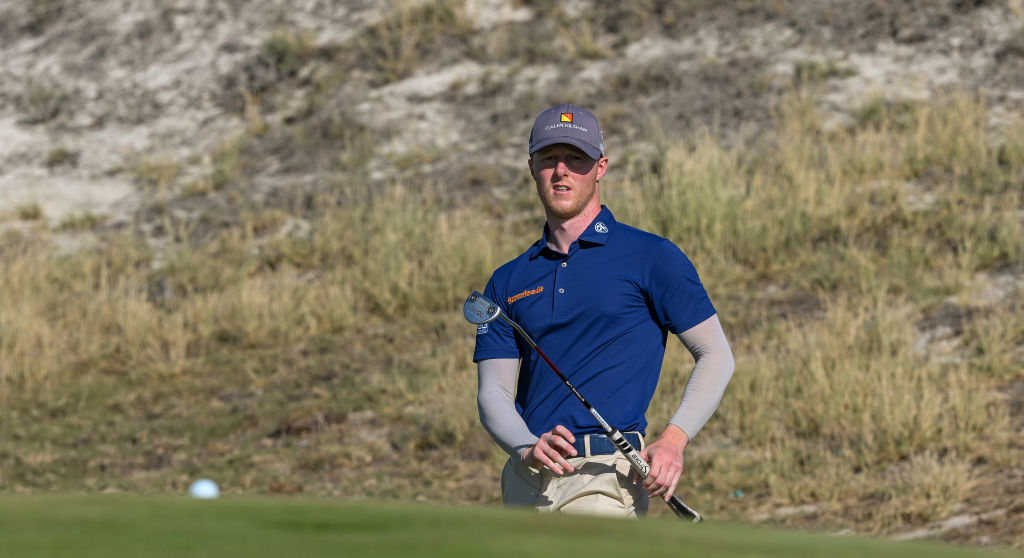 Howie posts course record to lead in Abu Dhabi